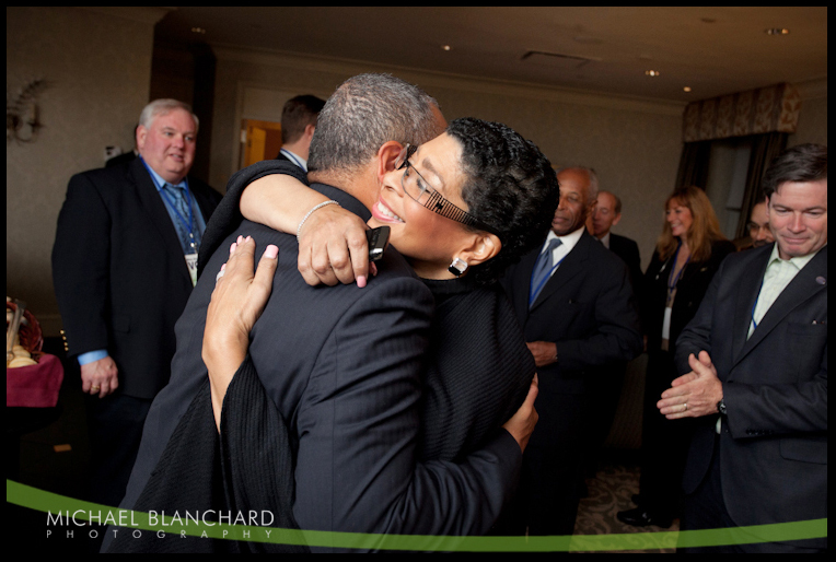 Carol Fulp embraces the Governor.