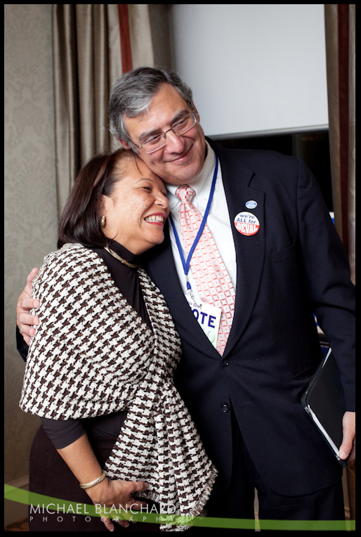 Carol Fulp embraces the Governor.